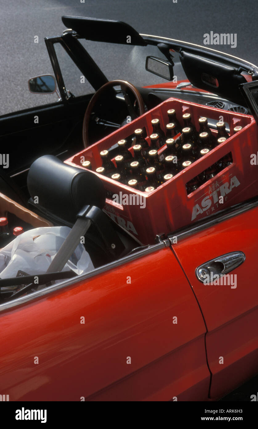 Bottles of traditional beer "Astra", expertly stowed in a case next to ...