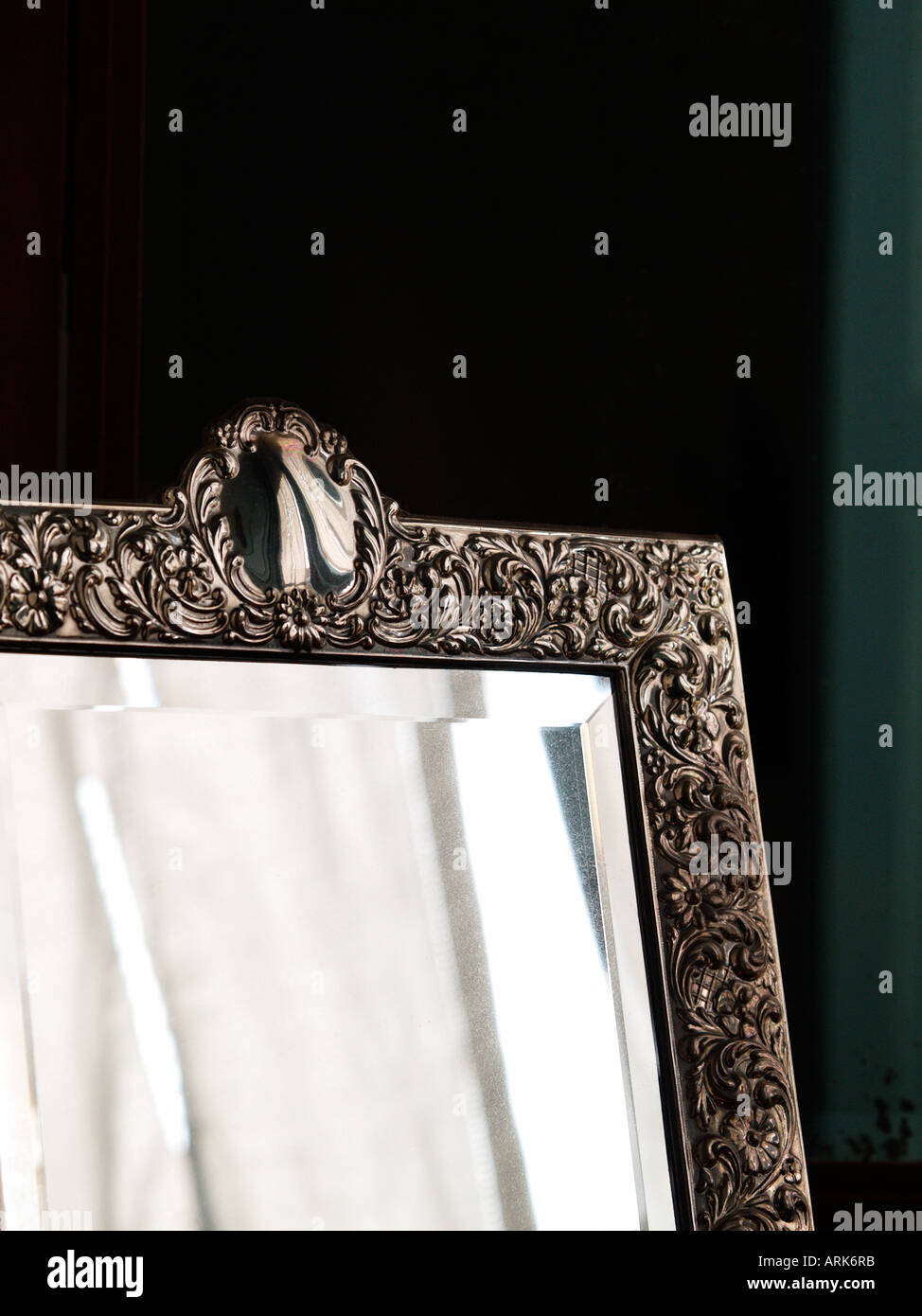 corner of mirror with ornate silver frame Stock Photo - Alamy