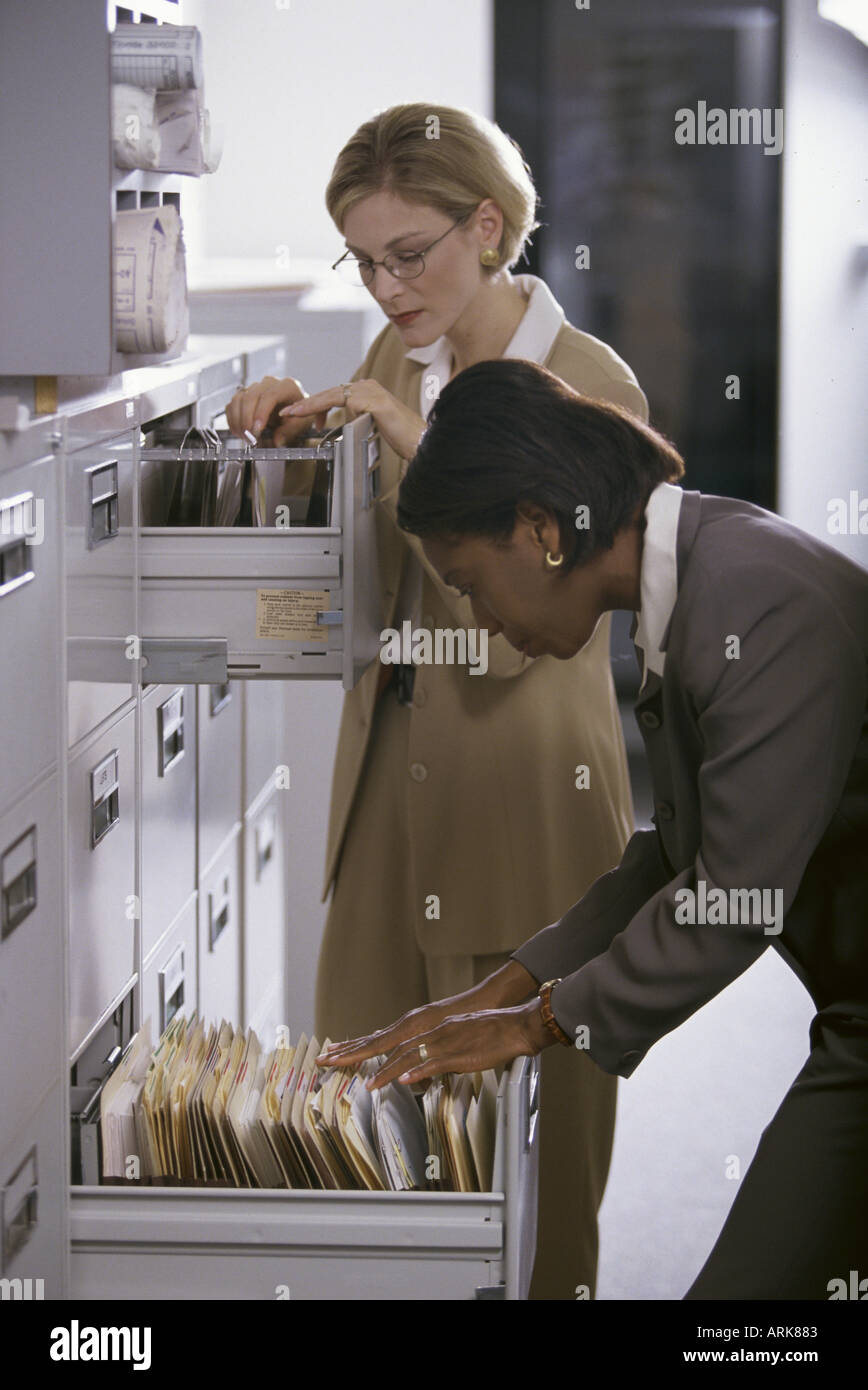 Women sorting files hi-res stock photography and images - Alamy