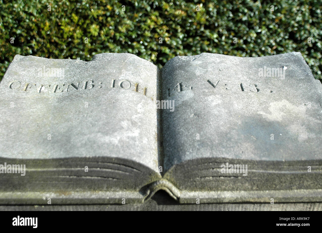Ancient gravestone with open bible, cemetery in Ohlsdorf, Hamburg ...