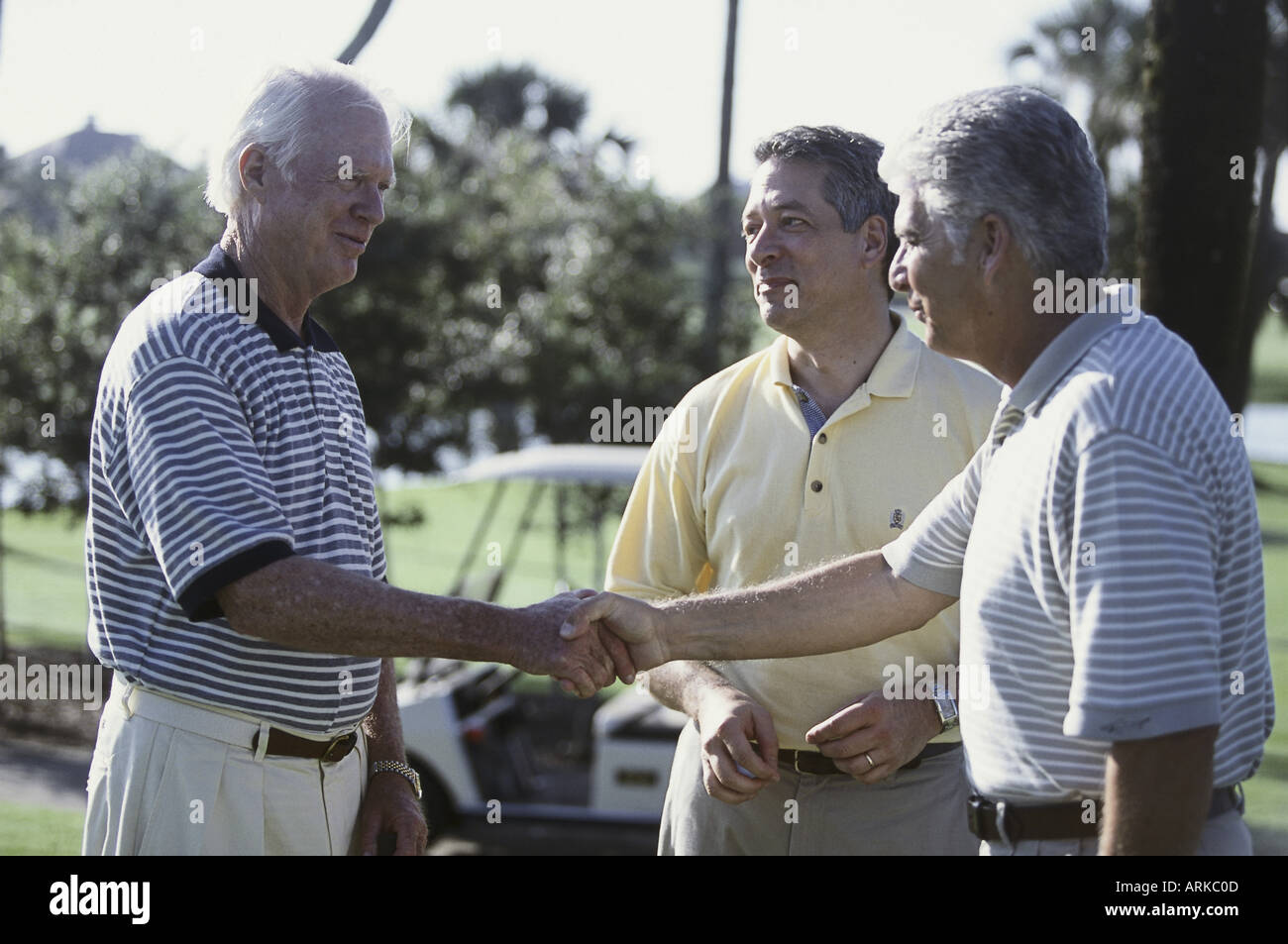 Golfers shaking hands hi-res stock photography and images - Alamy