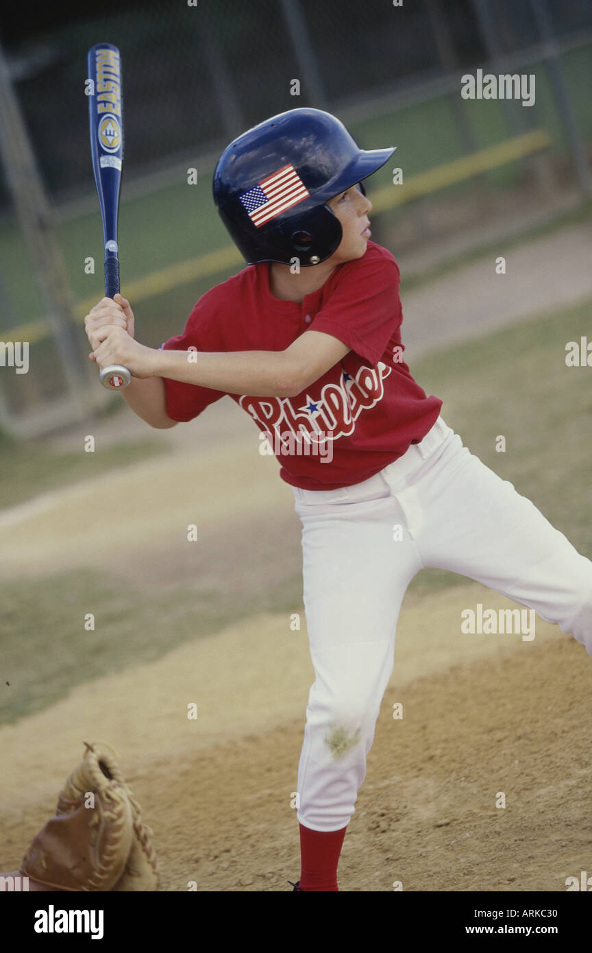 Child gripping baseball bat hi-res stock photography and images - Alamy