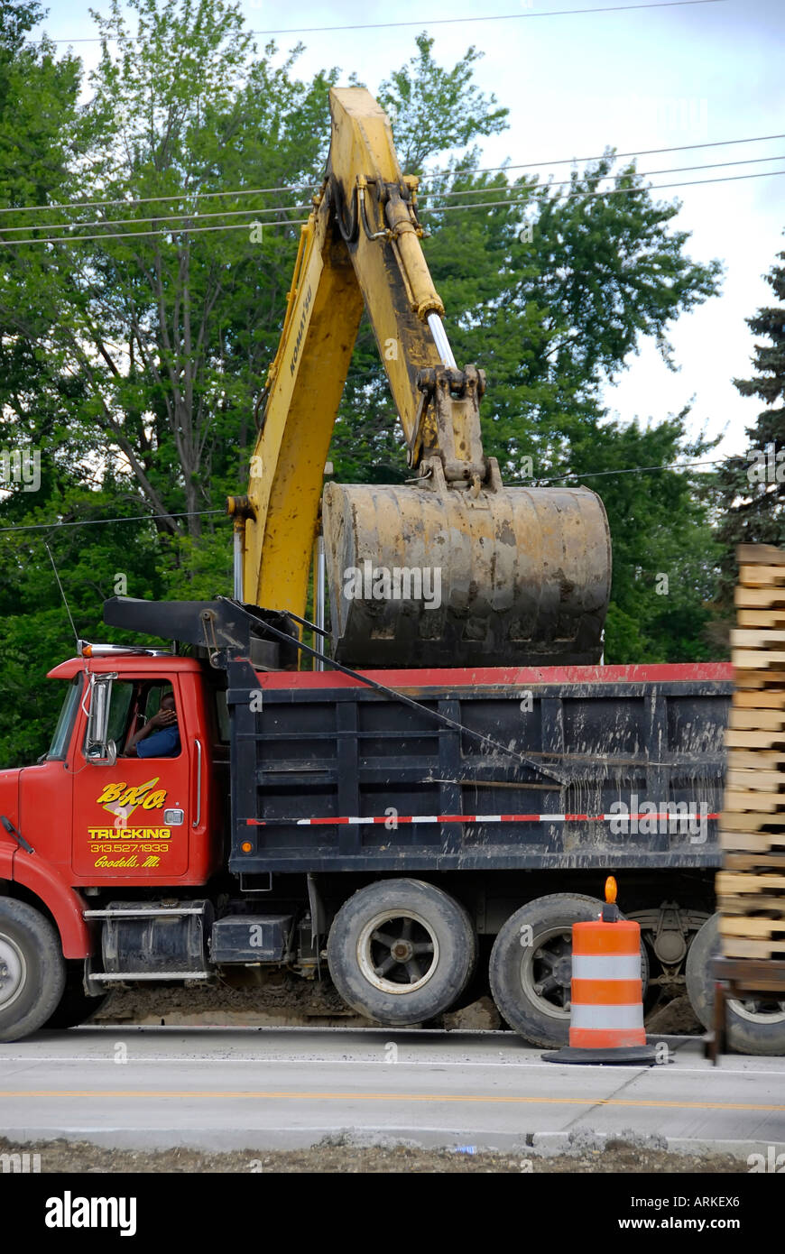 Heavy equipment working on the repair of a road Stock Photo - Alamy