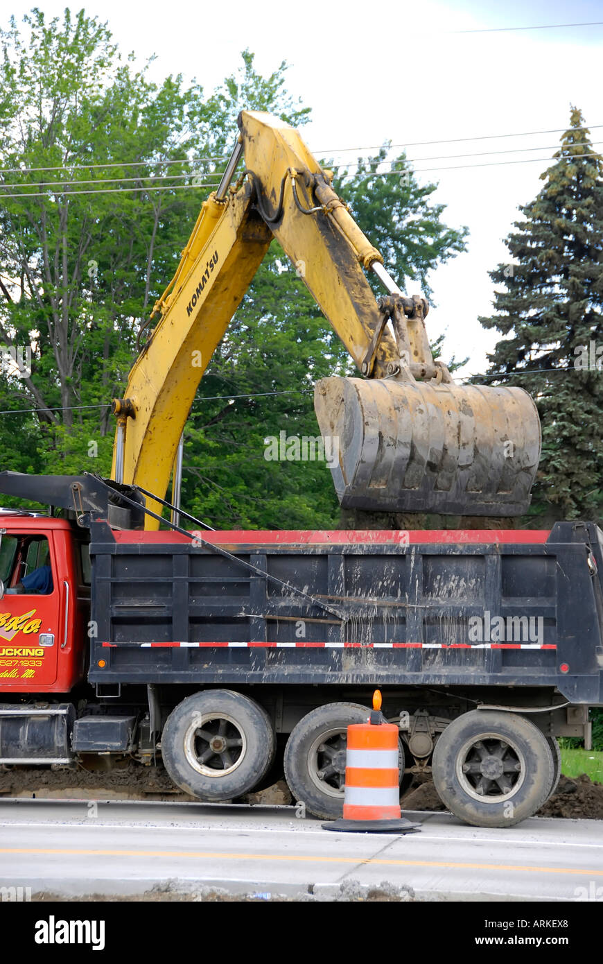 Heavy equipment working on the repair of a road Stock Photo - Alamy