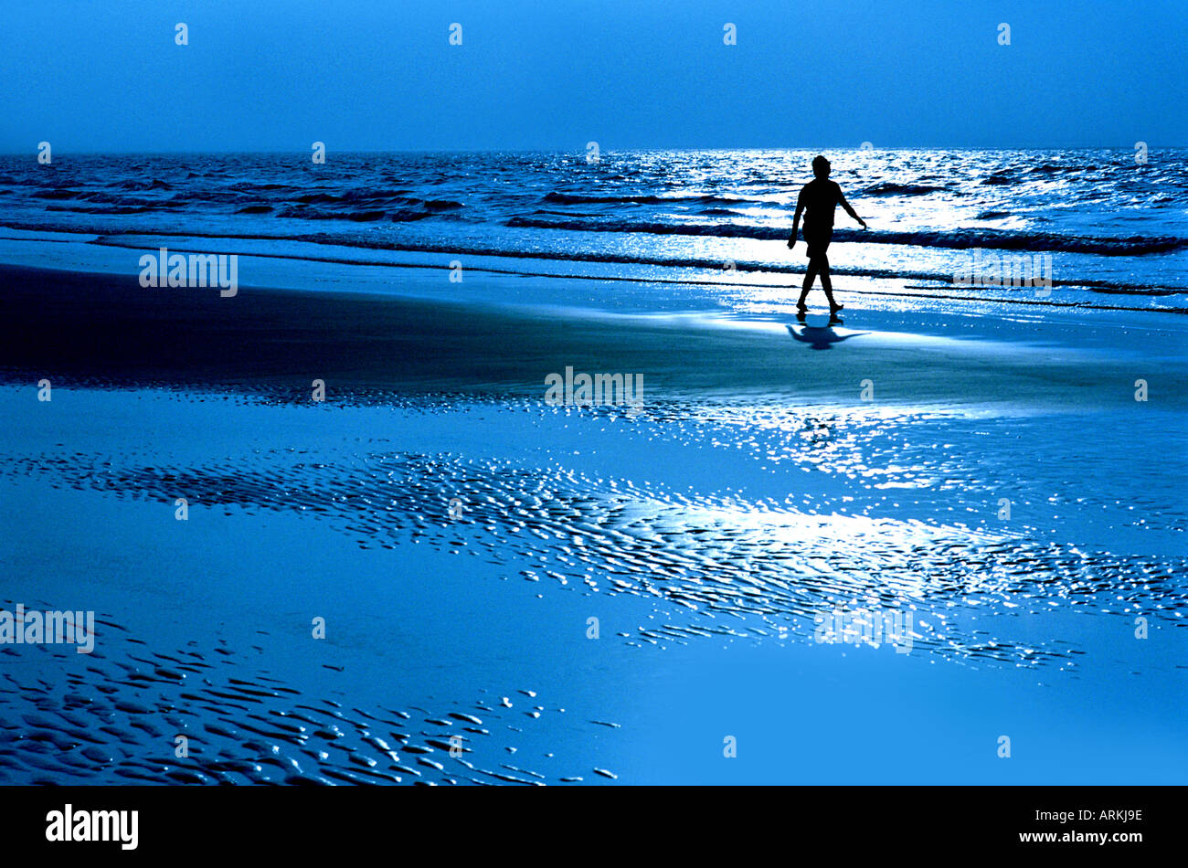 Morning stroll on the beach Stock Photo - Alamy