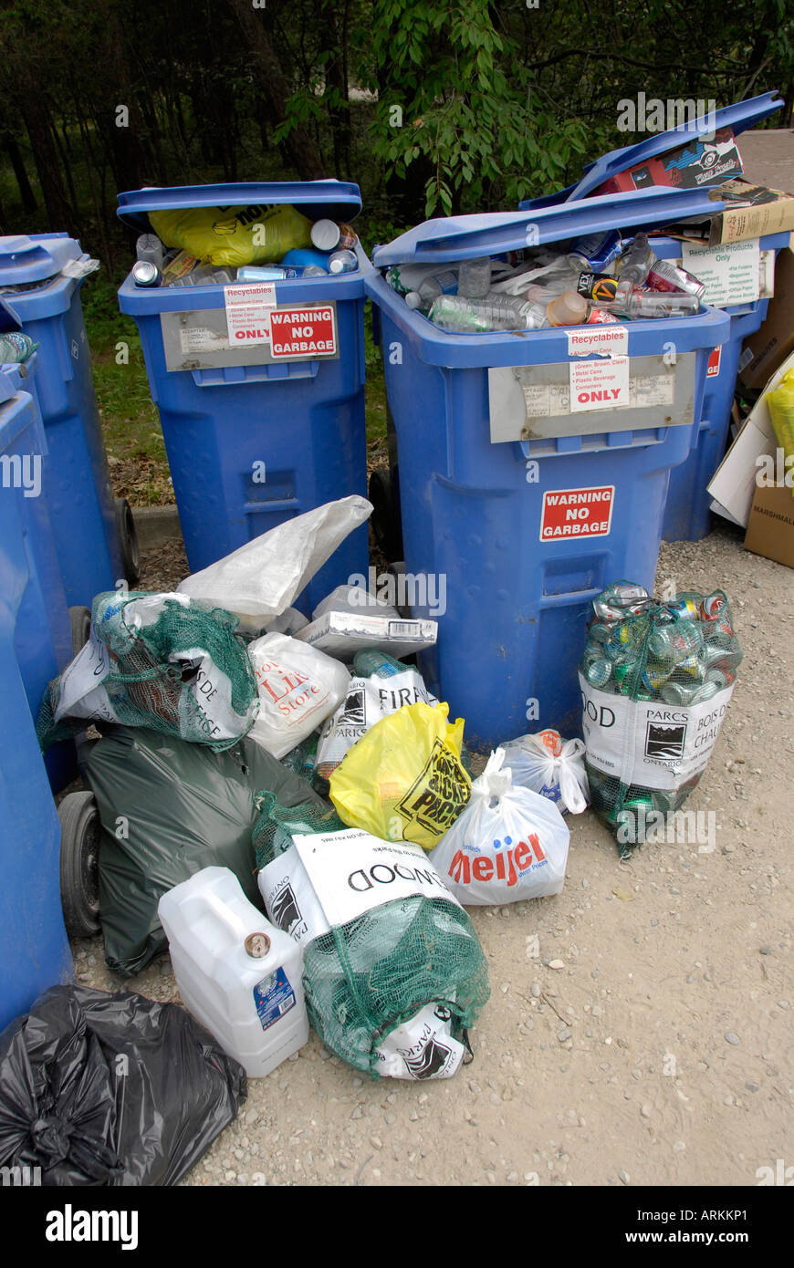 Separate trash containers set up campground recycl hi-res stock ...