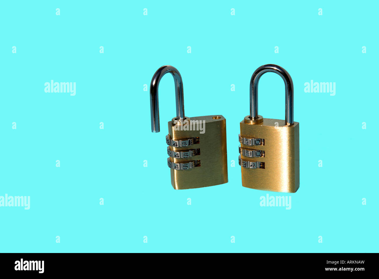 Two combination padlocks on blue background Stock Photo - Alamy