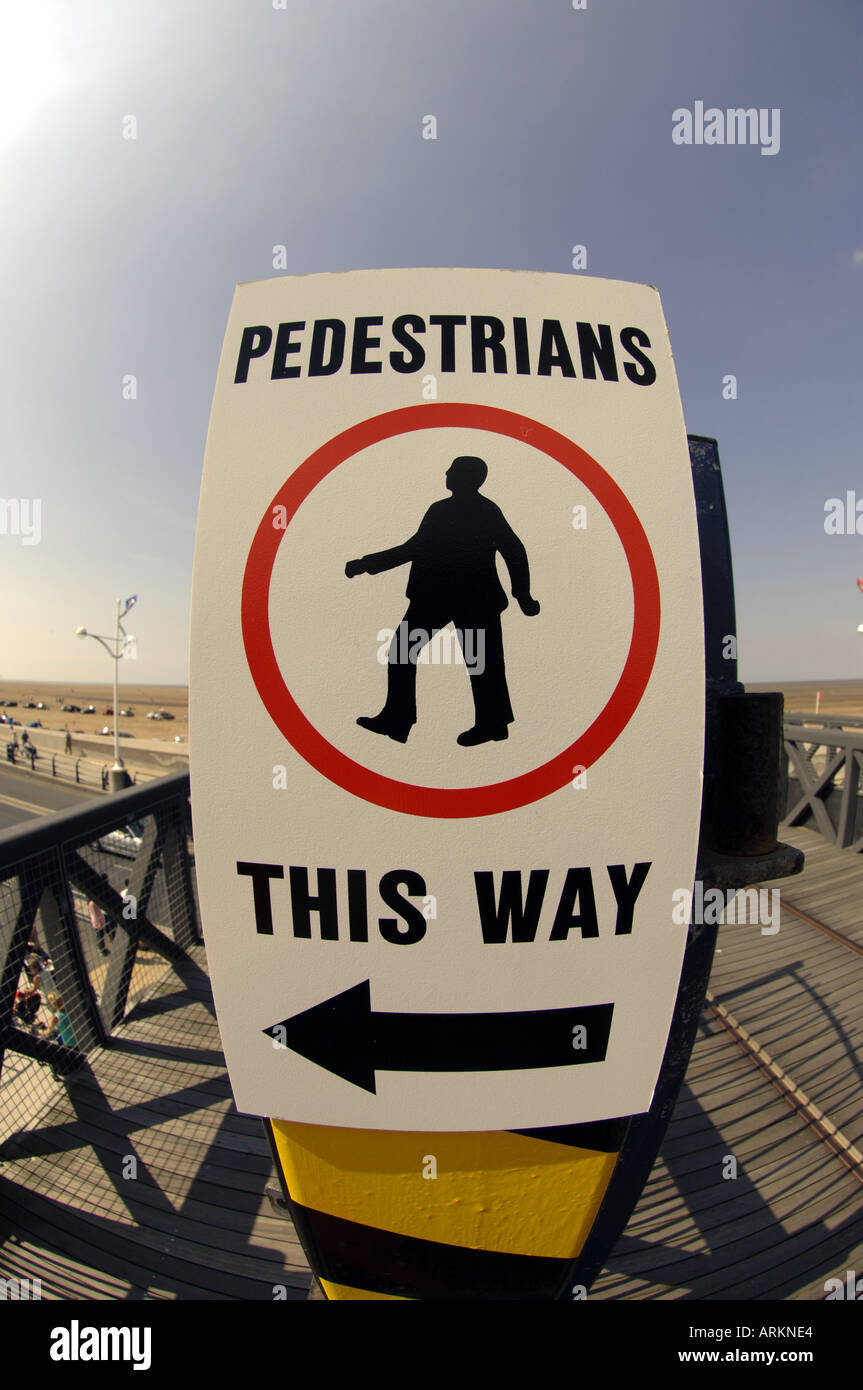 pedestrains this way, sign, walk Stock Photo - Alamy