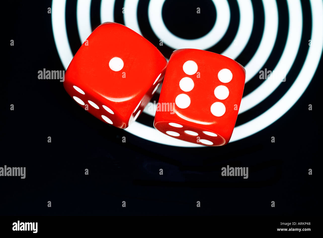 two red dice on contemporary red and black background Stock Photo - Alamy