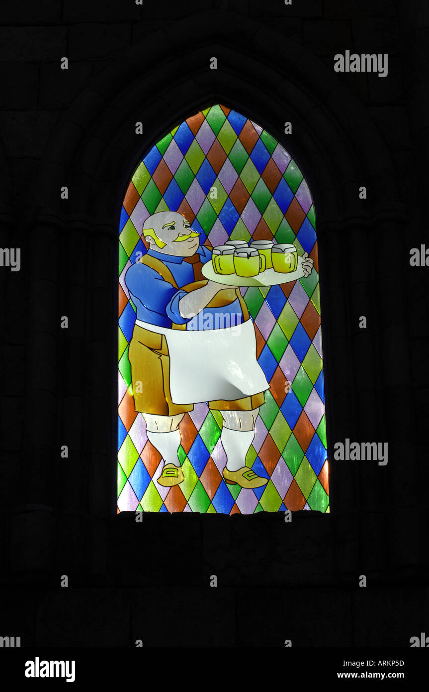 german barman carrying a tray of beers Stock Photo - Alamy