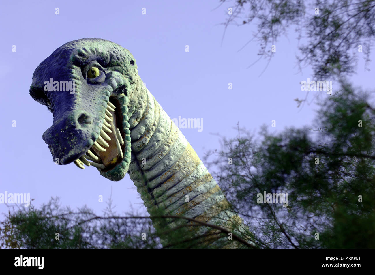 plastic dinosaur, monster, kitsch, blue, sky, horizontal, head, teeth ...