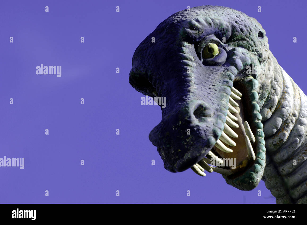 plastic dinosaur, monster, kitsch, blue, sky, horizontal, head, teeth ...