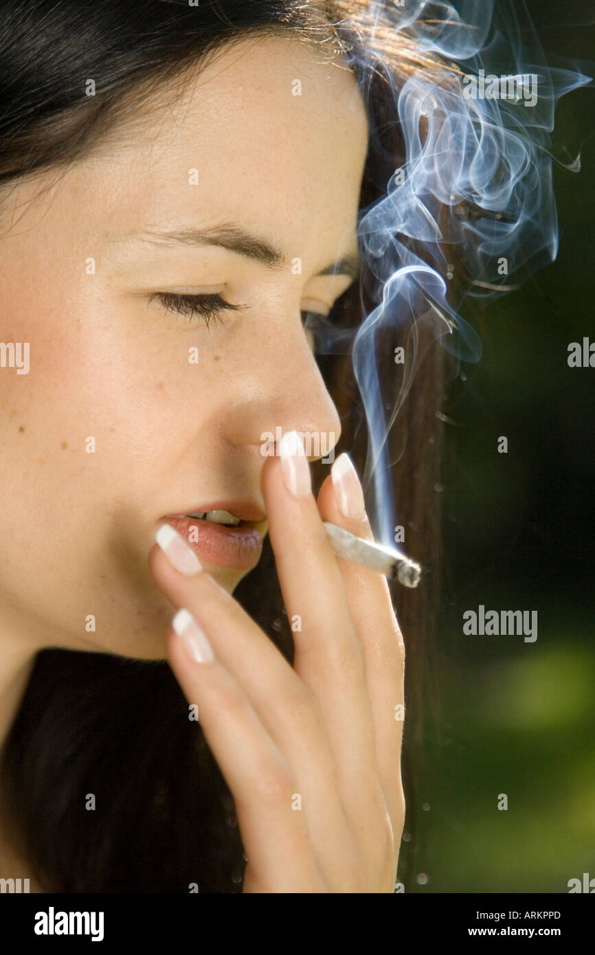 Young Hand Holding Lit Cigarette High Resolution Stock Photography and ...