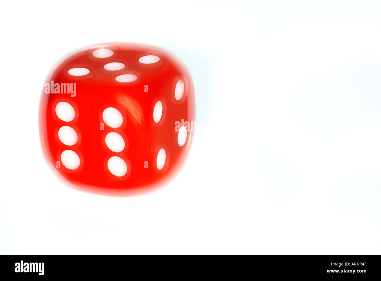 red die on white background Stock Photo - Alamy