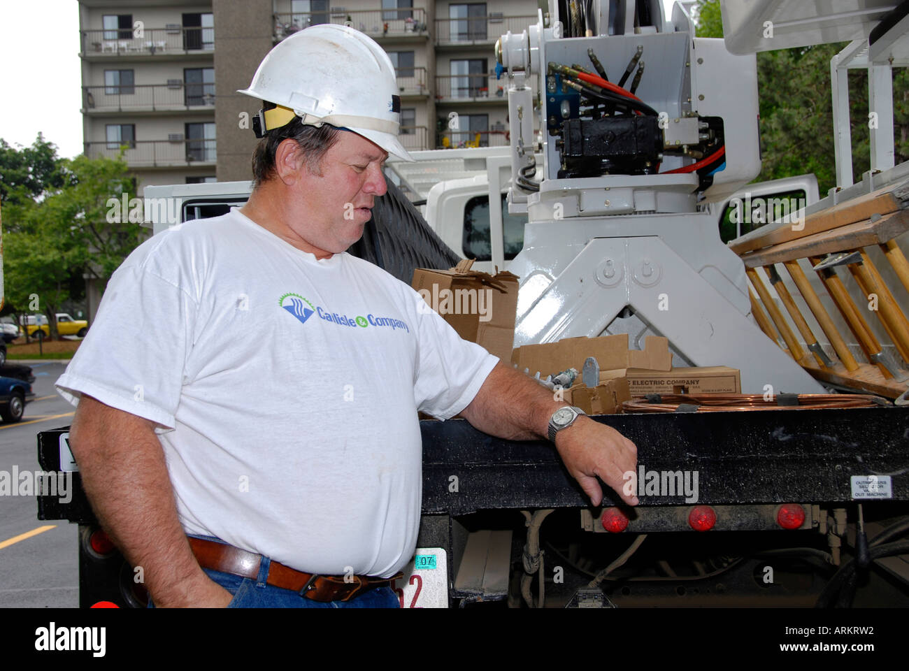 Construction worker looks at his watch to check schedule timing Stock ...