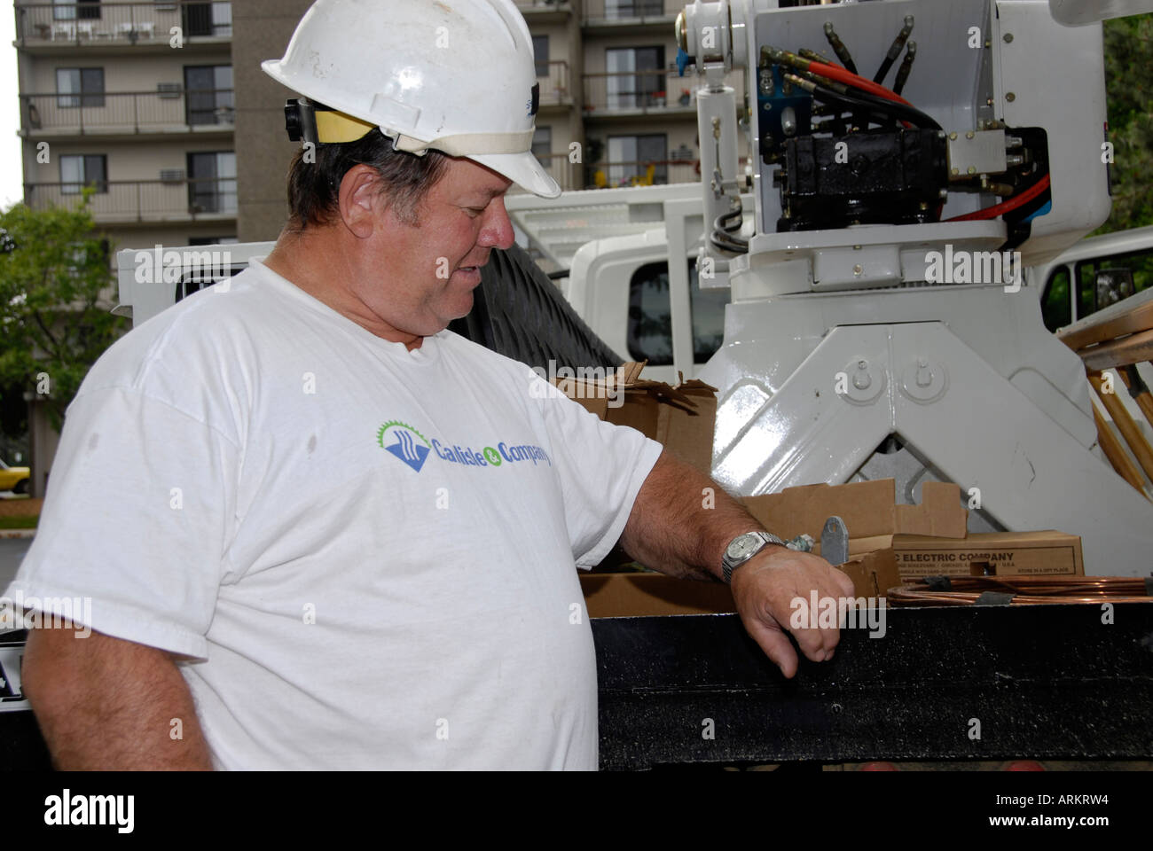 Construction worker looks at his watch to check schedule timing Stock ...