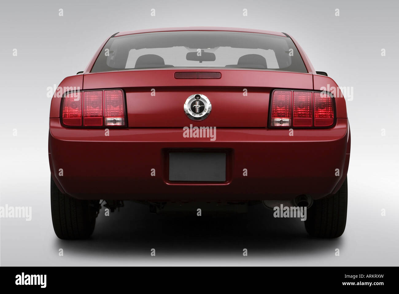 2008 Ford Mustang V6 Deluxe in Red - Low/Wide Rear Stock Photo - Alamy