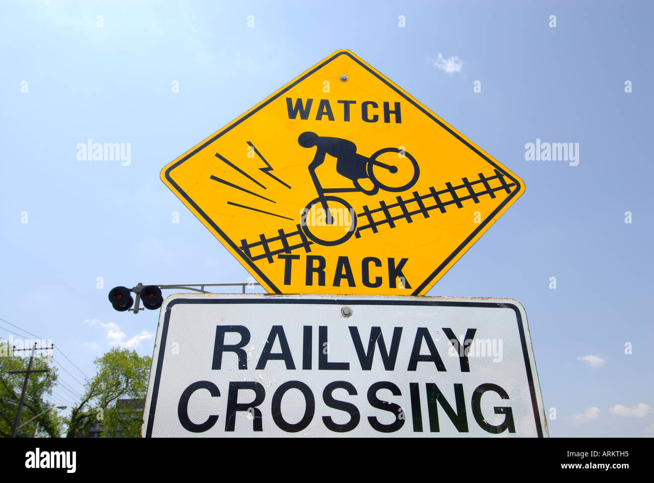 Railroad crossing sign stating railway crossing is dangerous for ...
