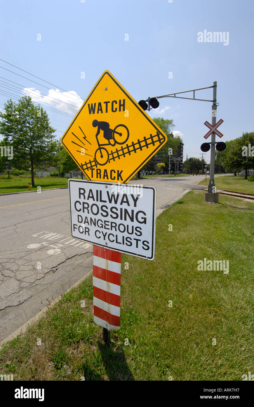 Railroad crossing sign stating railway crossing is dangerous for ...