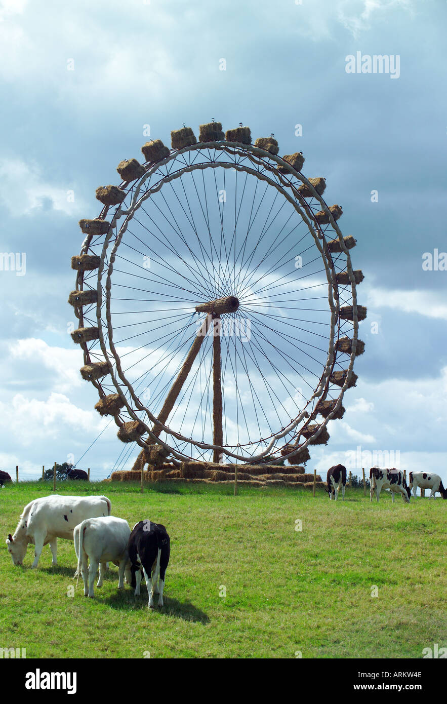 Ferris wheel hay sculpture in cow field Stock Photo - Alamy