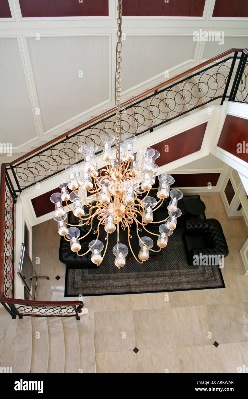 Elegant chandelier and staircase luxurious interior design Stock Photo ...