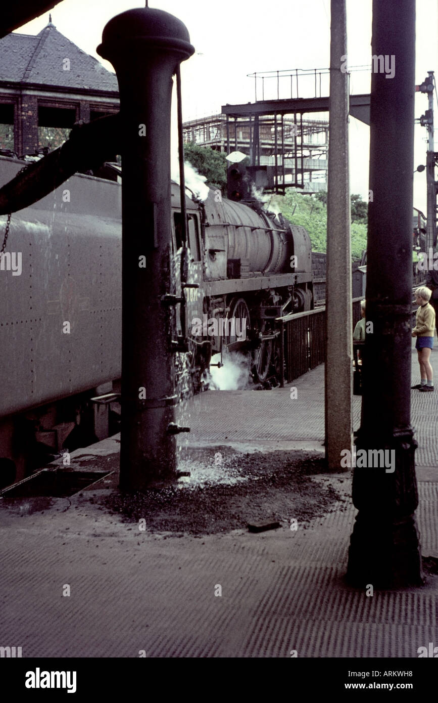 A Steam locomotive takes water at Lancaster Station, August 1967 Stock ...
