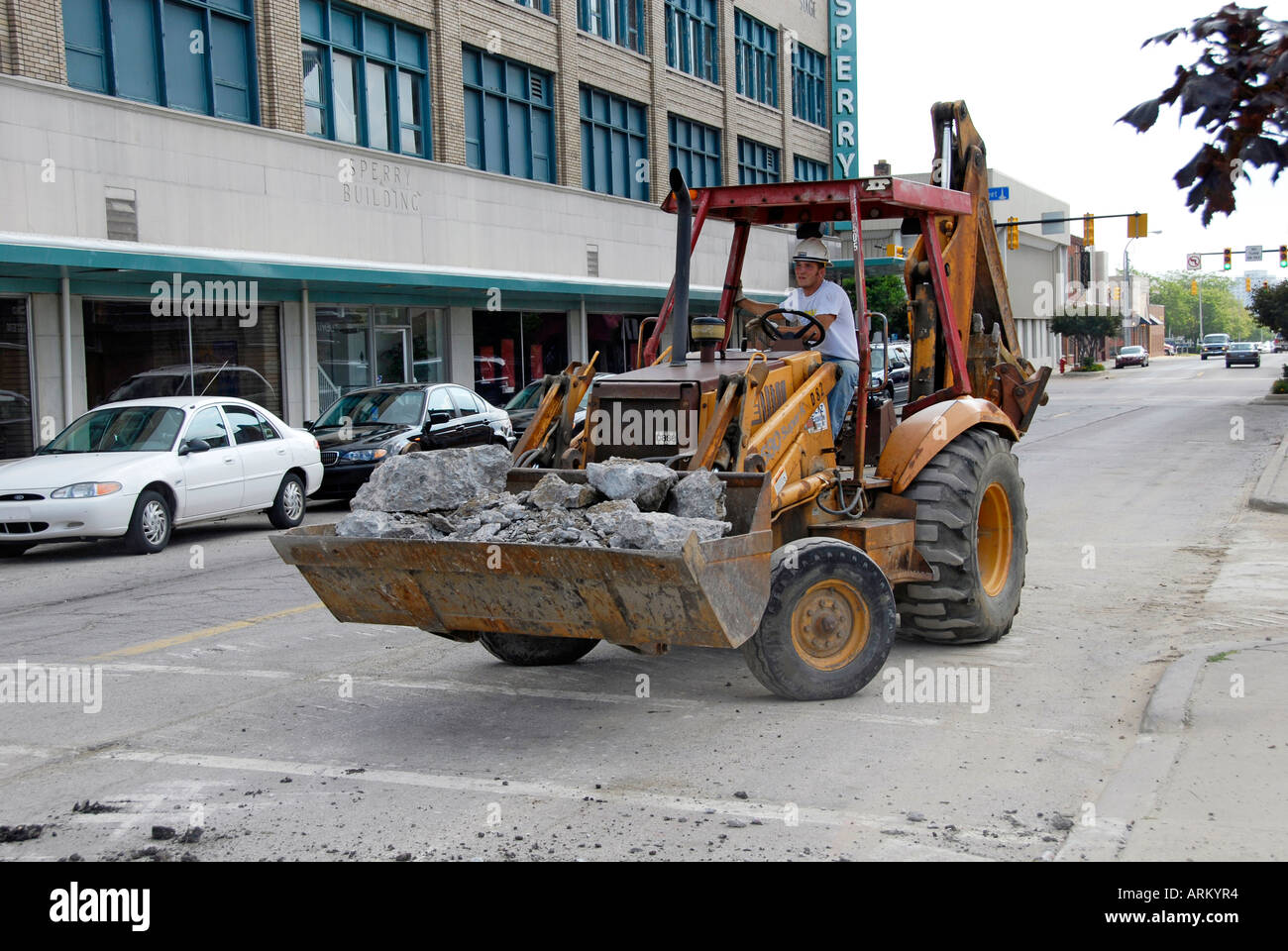 Road repair construction site with heavy equipment Stock Photo - Alamy