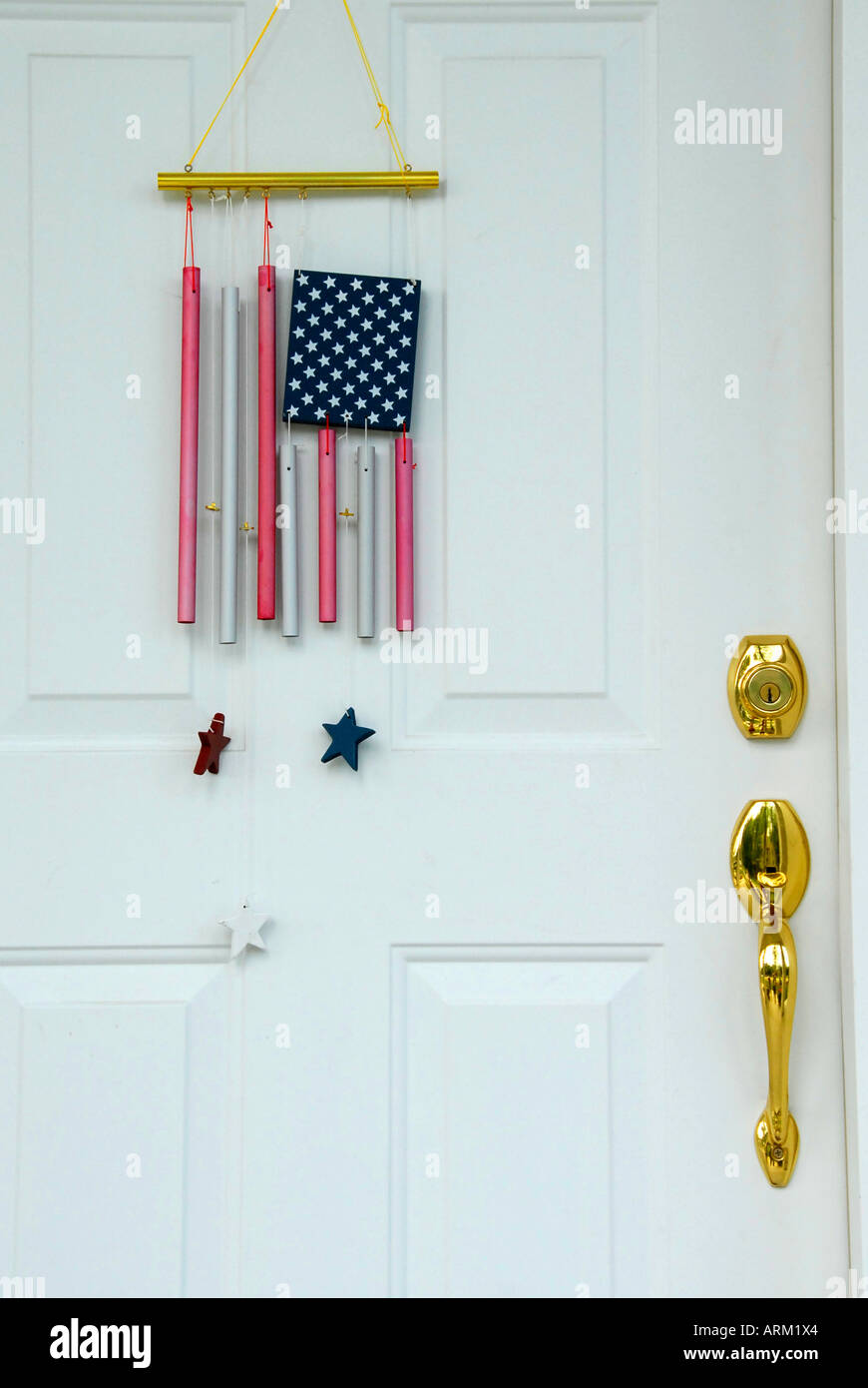 Door with flag wind chimes Stock Photo - Alamy