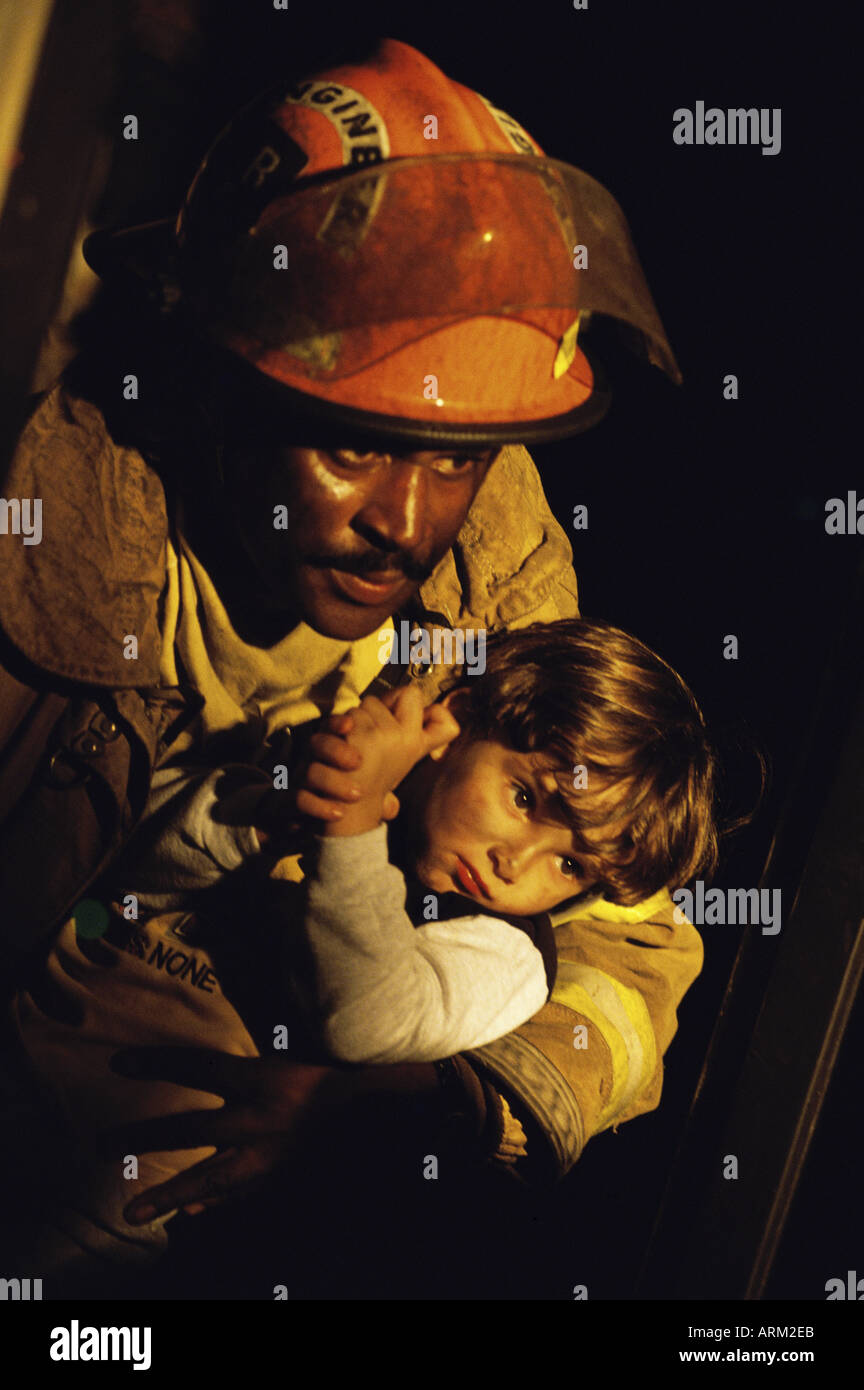Fireman Rescuing Child High Resolution Stock Photography and Images - Alamy