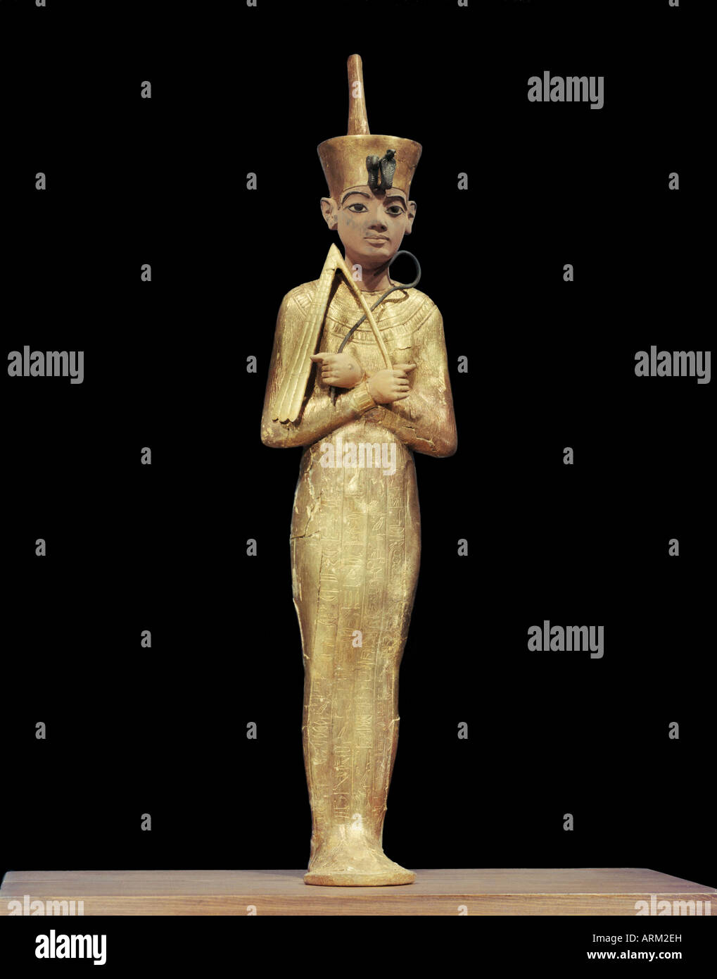 Ushabti of Tutankhamun, showning king wearing the red crown of the ...