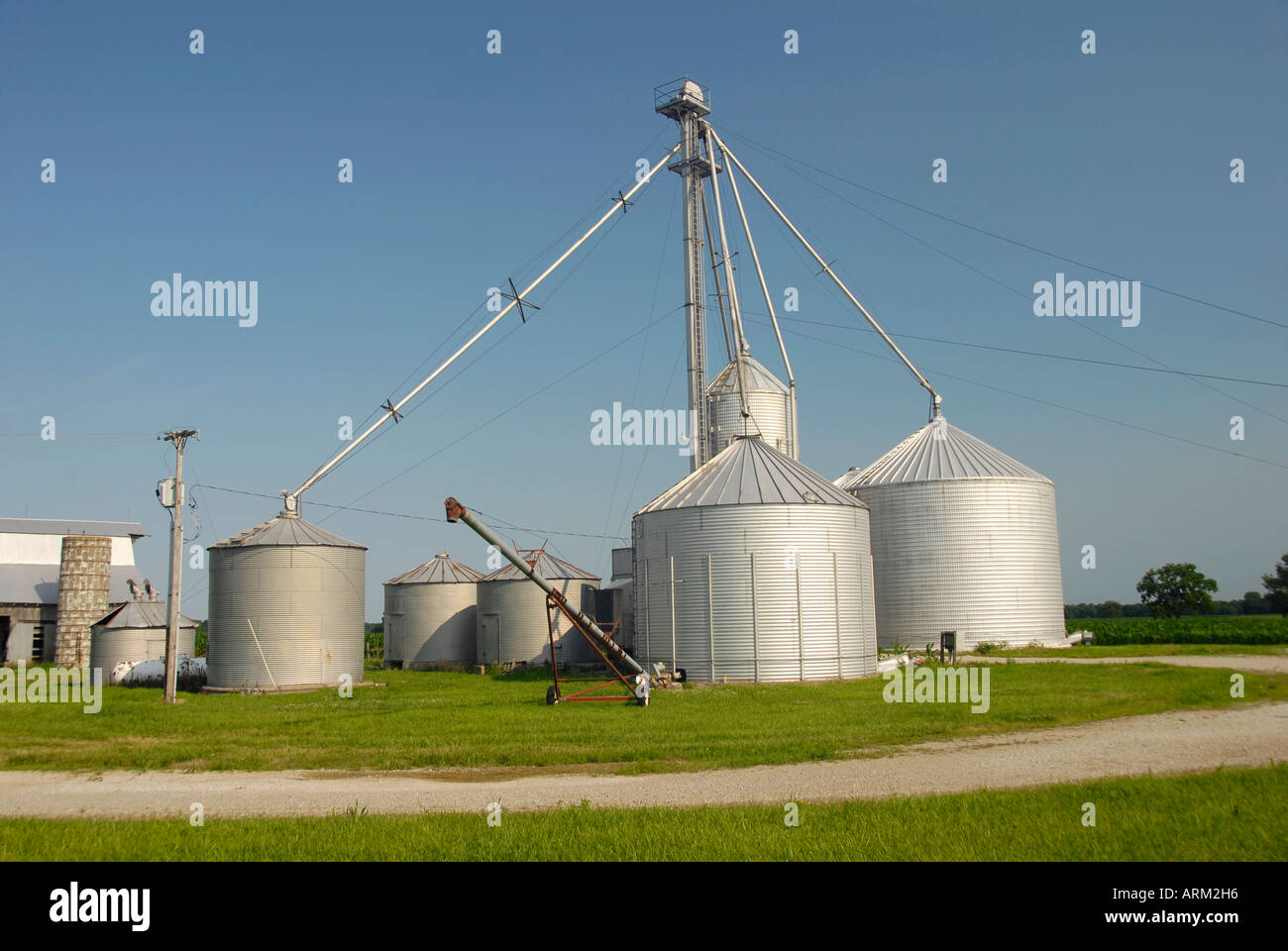 Grain storage bins on Middle Indiana IN Soybean farm Stock Photo - Alamy