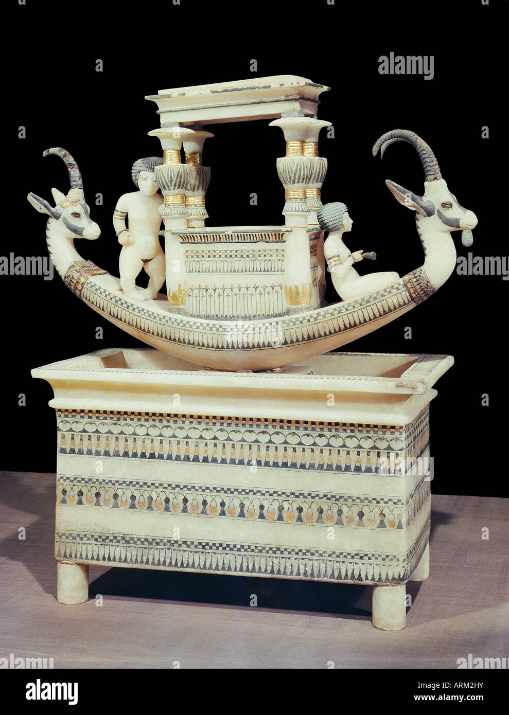 Alabaster boat showing the head of a Syrian ibex and a figure thought ...