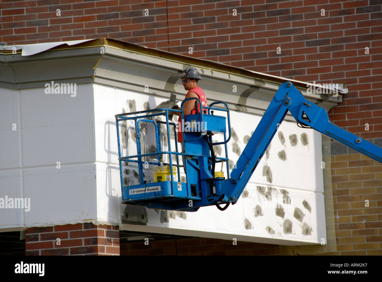 Construction worker building a new Super Wal Mart Stock Photo - Alamy