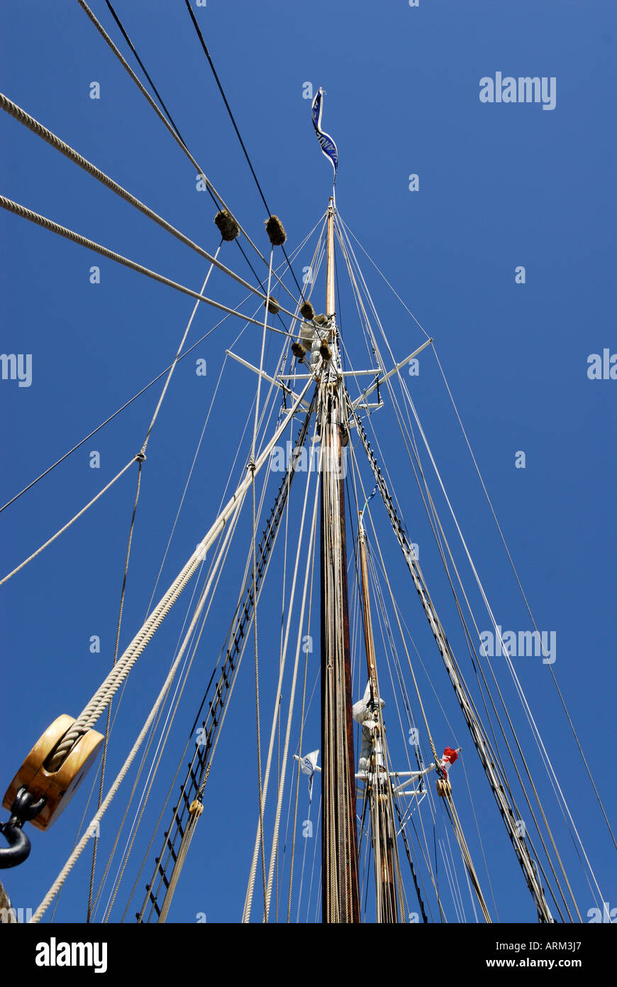 The masts of a tall ship sailing vessel show many angles with ropes and ...