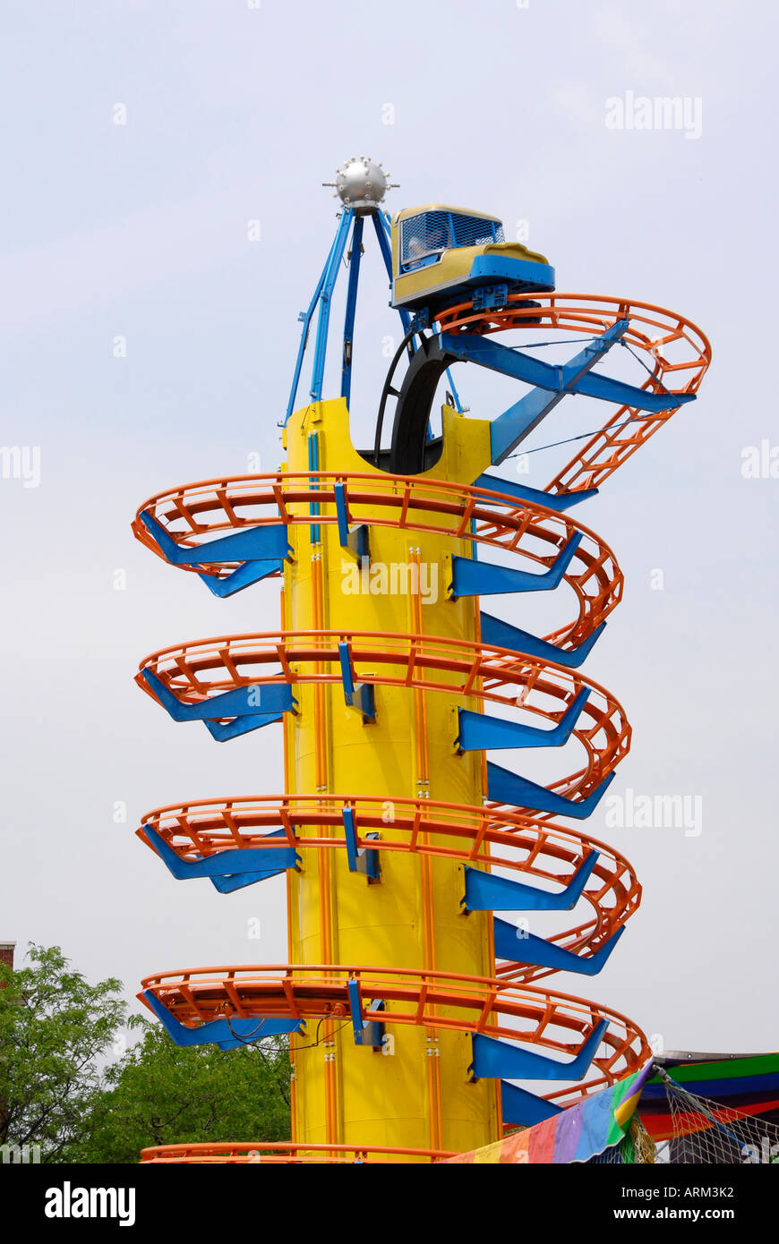 Kids ride exciting and daring rides at a carnival festival Stock Photo ...