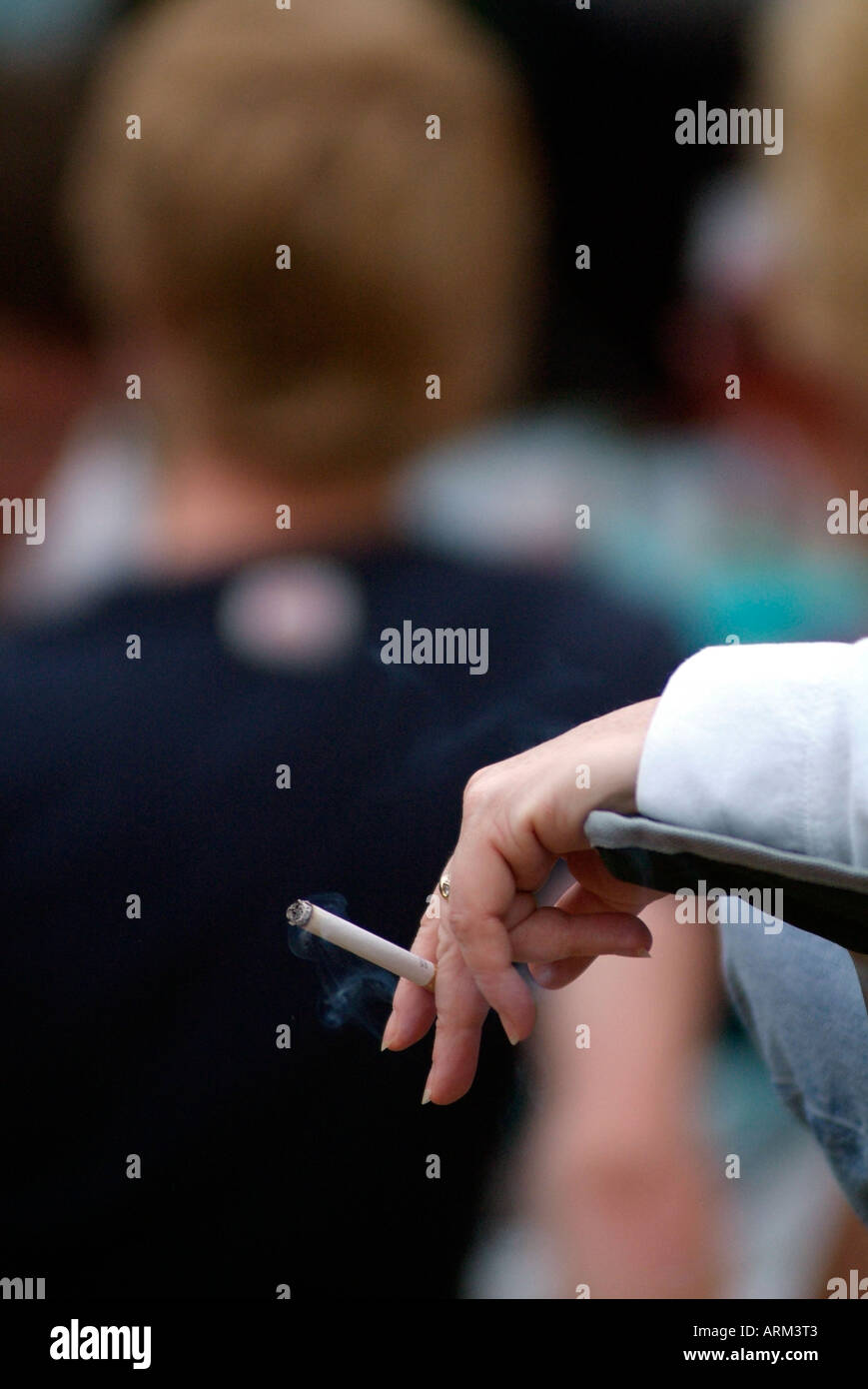 Lit cigarette woman hand smoke hi-res stock photography and images - Alamy