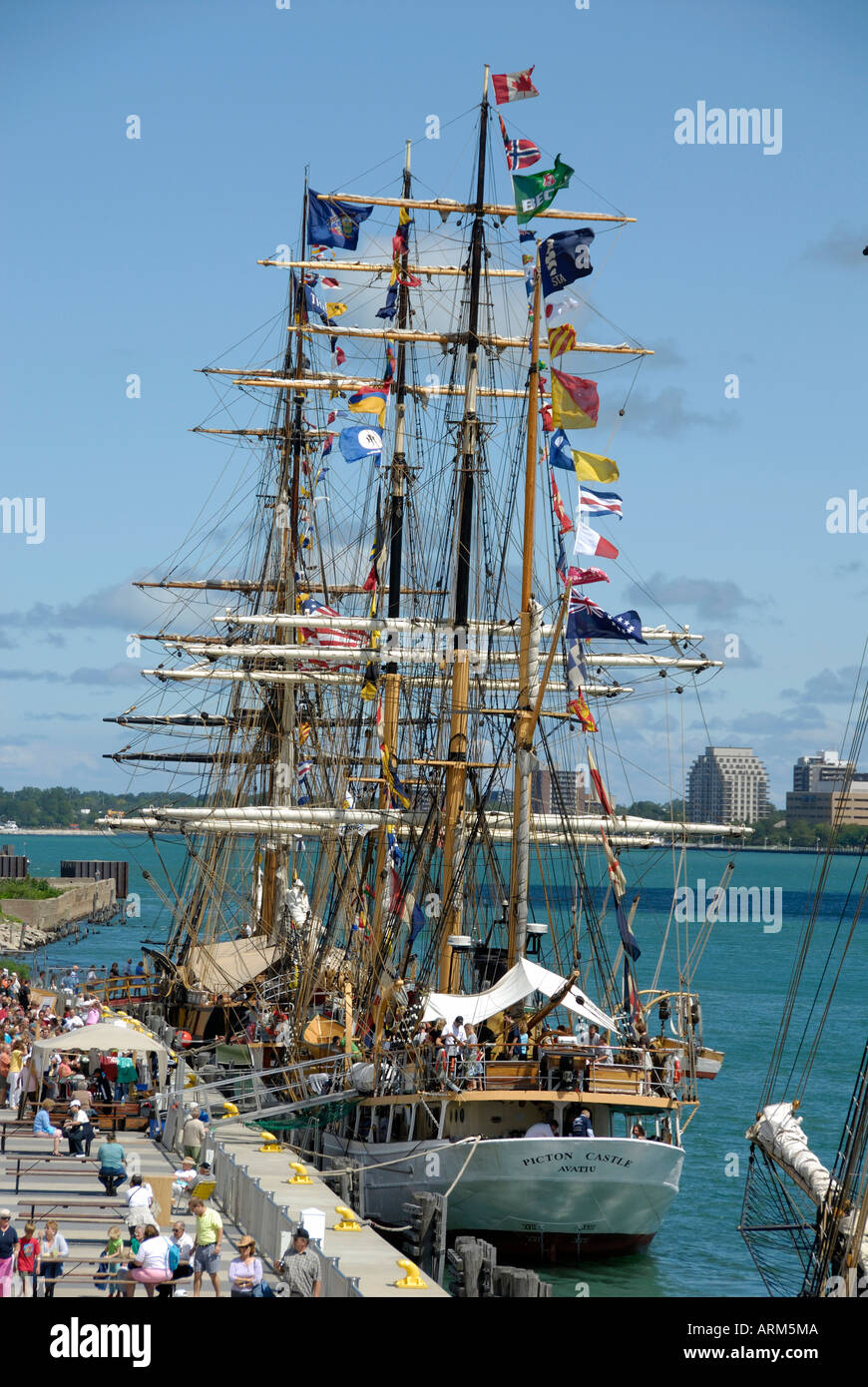 The masts of a tall ship sailing vessel show many angles with ropes and ...