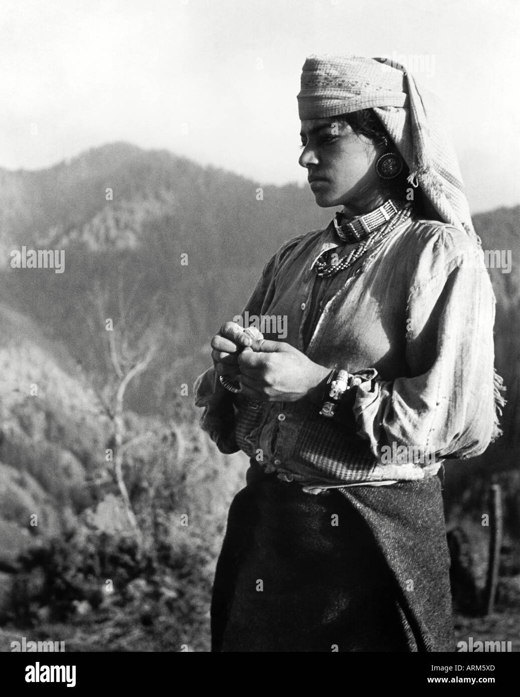 Old Vintage Indian Woman In Traditional Dress Head Covered Pauri