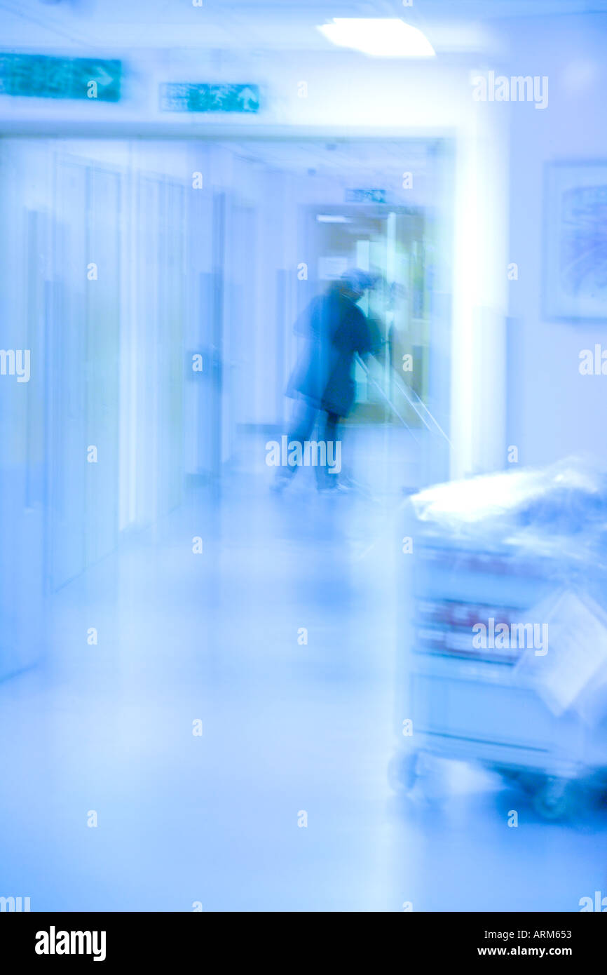 Hospital cleaner in medical ward corridor Stock Photo - Alamy