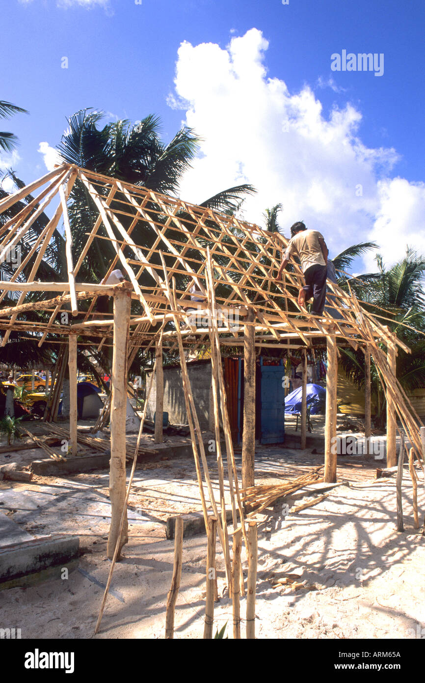 Local natives constructing a new building in Cozumel Mexico on the ...
