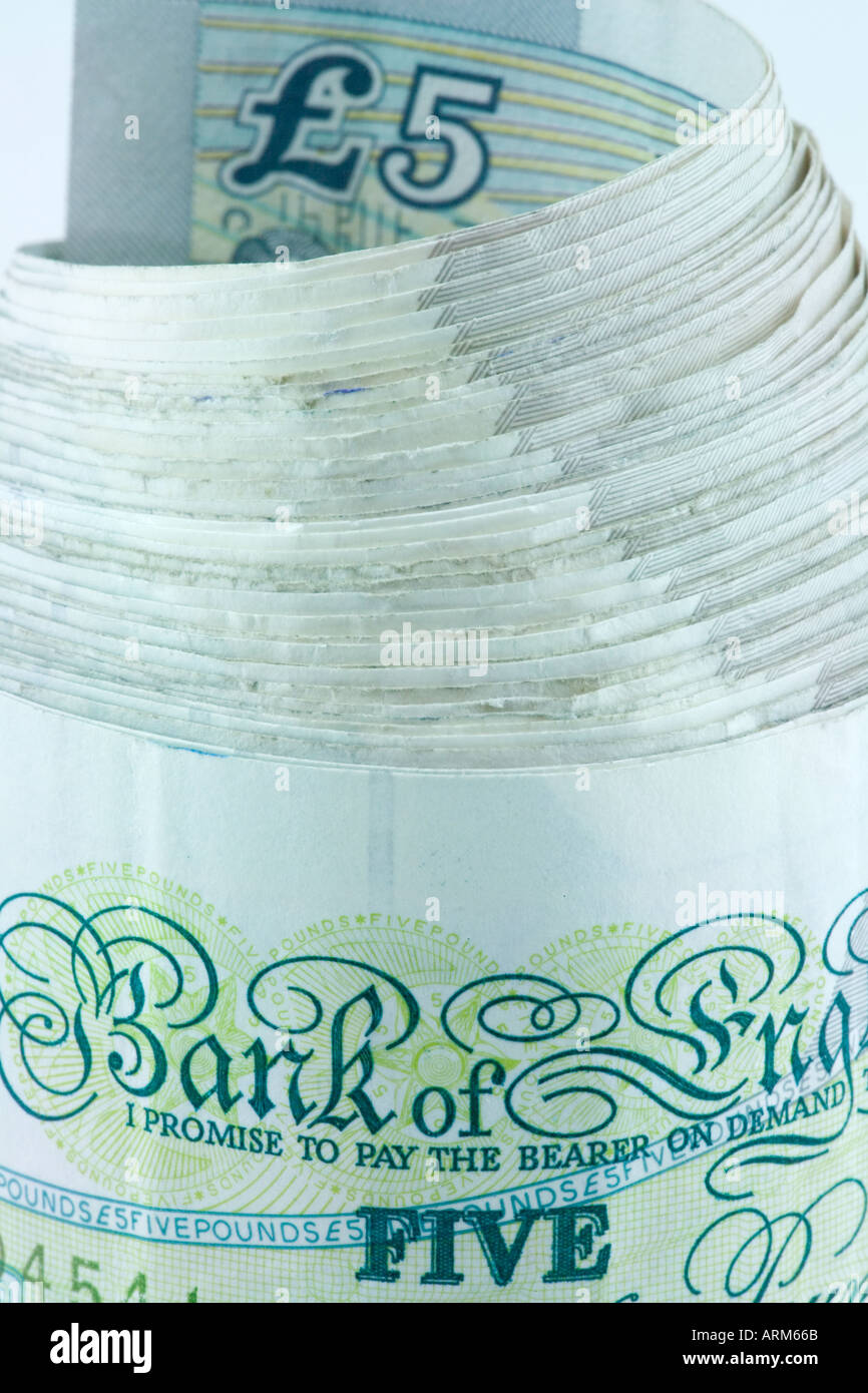Five pound notes close up in a roll 5 Stock Photo - Alamy