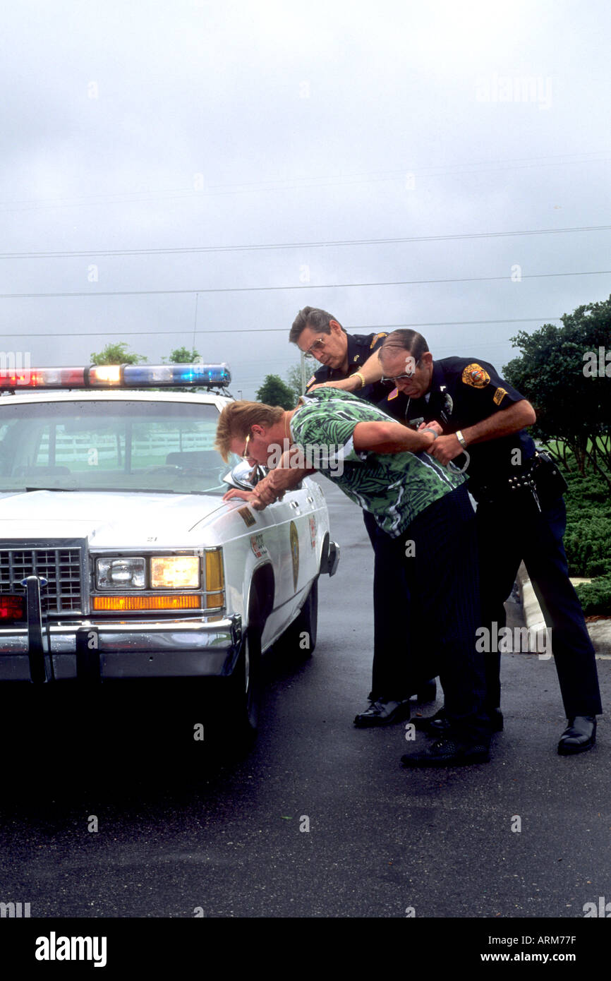 Man under arrest hi-res stock photography and images - Alamy