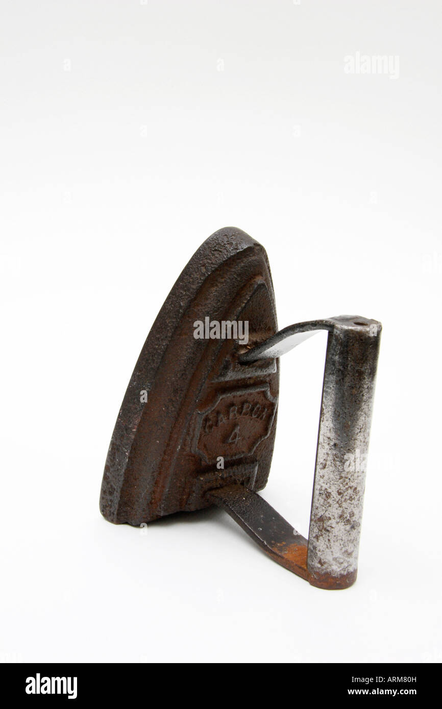 An old Victorian antique domestic smoothing iron Stock Photo - Alamy