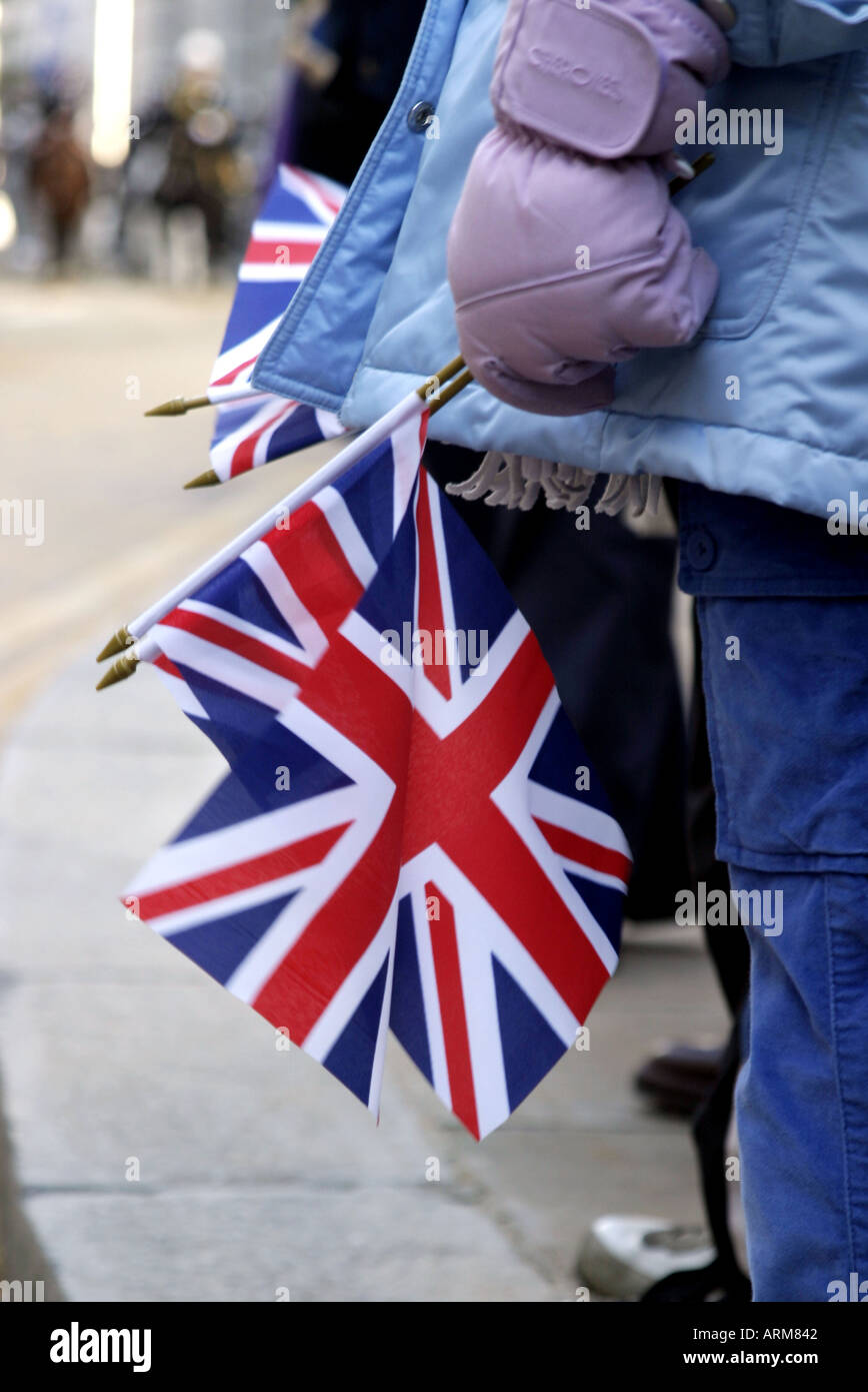 A child holding a Union Jack flag in London Stock Photo - Alamy