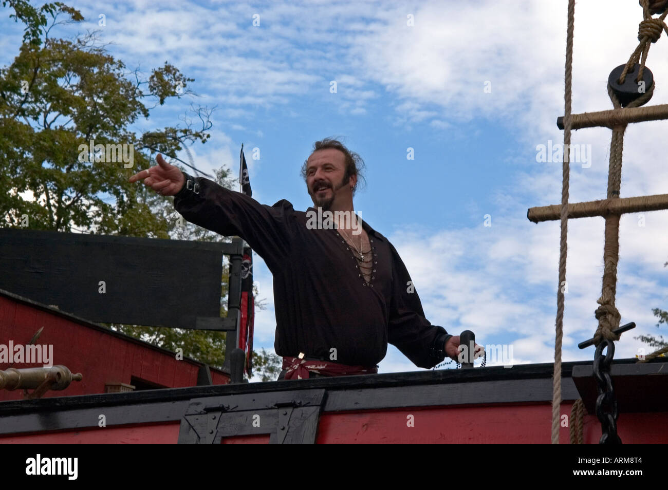 Pirate give the command from pirates boat, Renaissance Fair ...