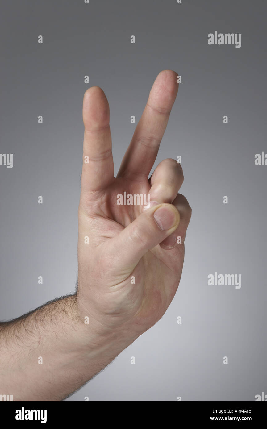 Hand v hi-res stock photography and images - Alamy