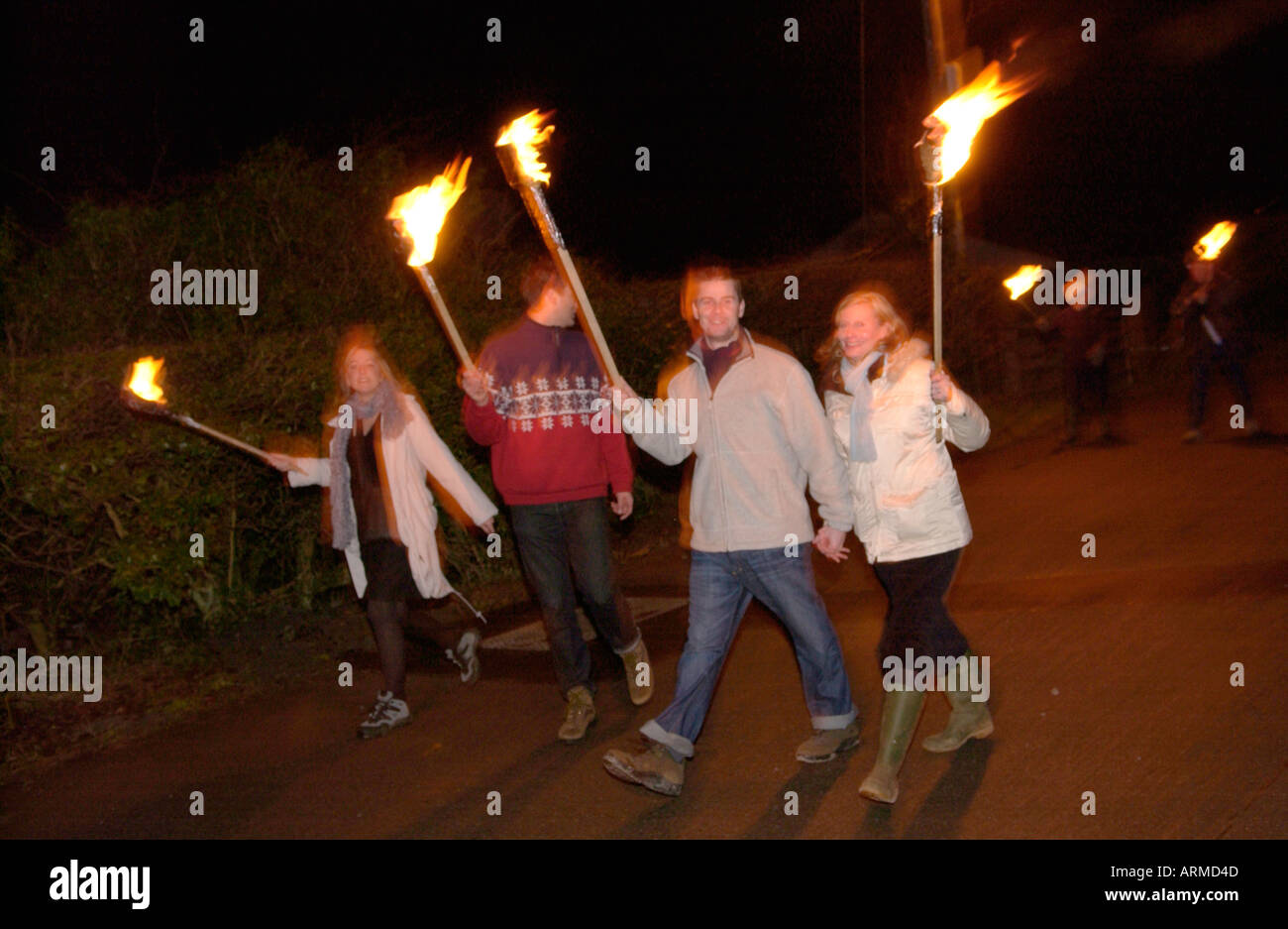 Burning torch light procession on the streets of Llanwrtyd Wells Powys ...