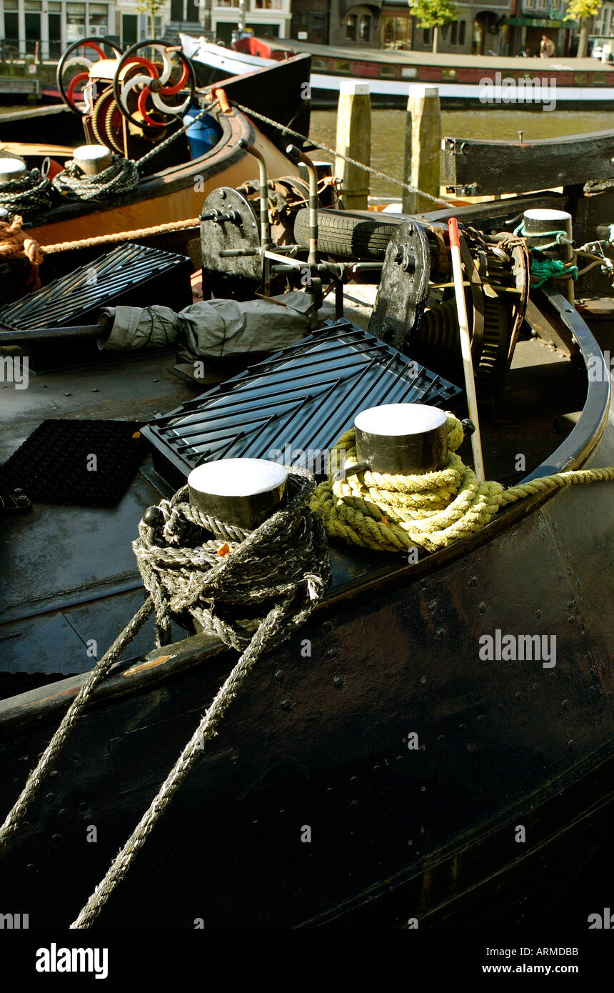 Mooring bitts of barge with ropes Stock Photo - Alamy