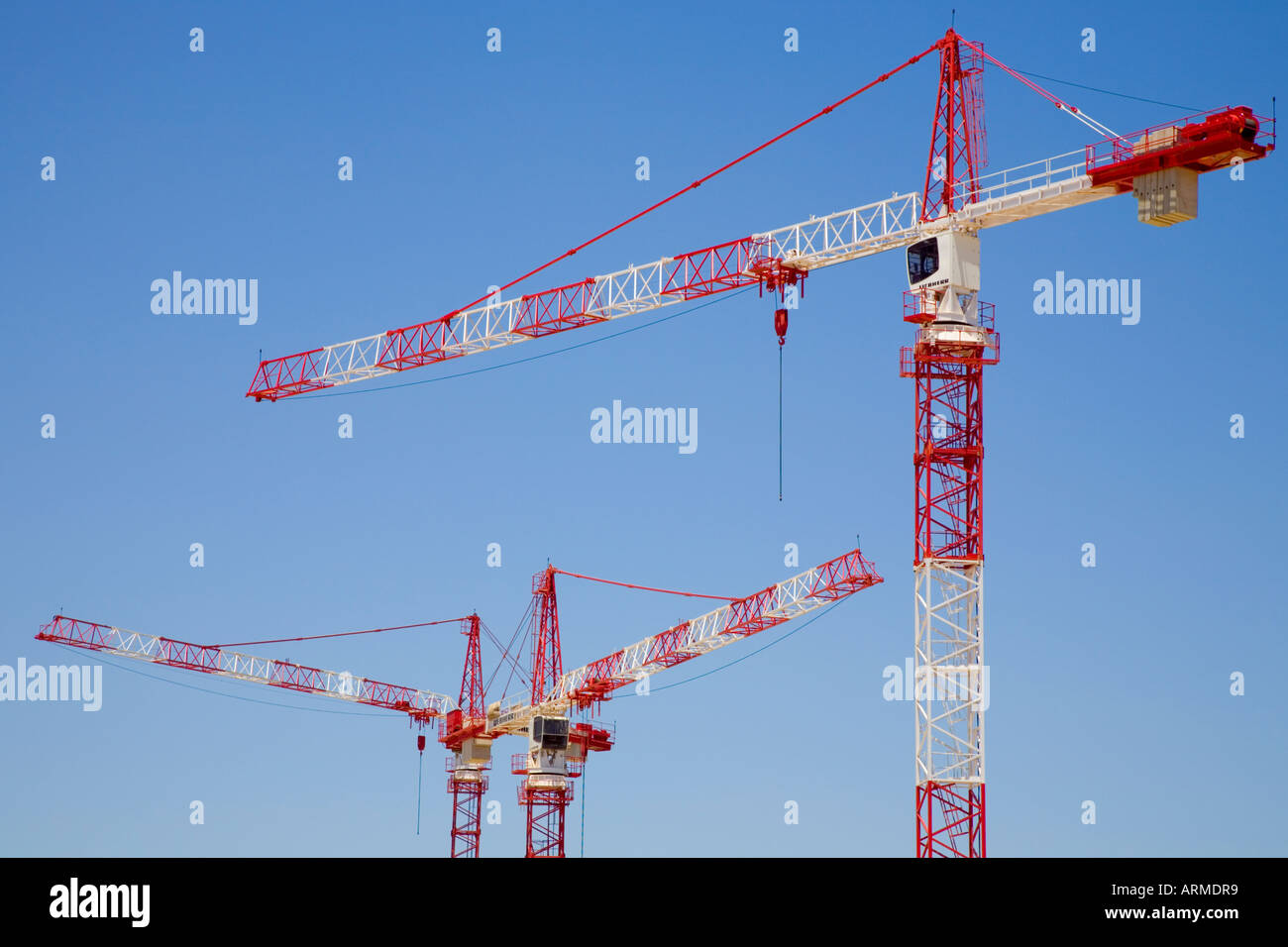 Construction cranes on building site Stock Photo - Alamy