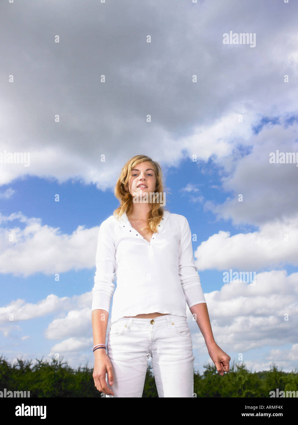 Girl standing still Stock Photo - Alamy
